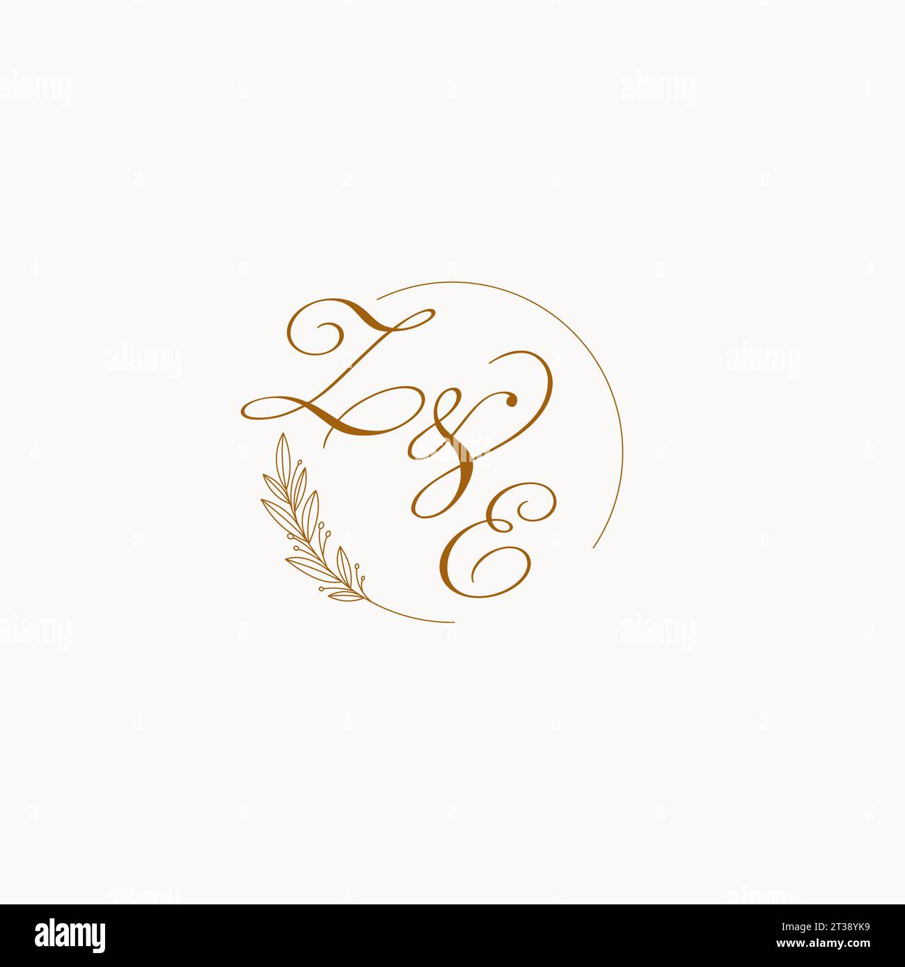 Initials ZE wedding monogram logo with leaves and elegant circular ...