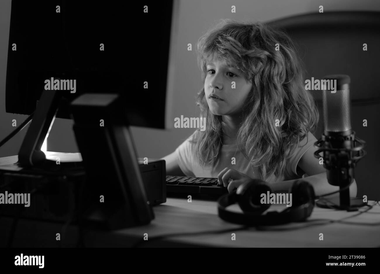 Little boy at the pc computer screen. Cute preschool kid is watching ...