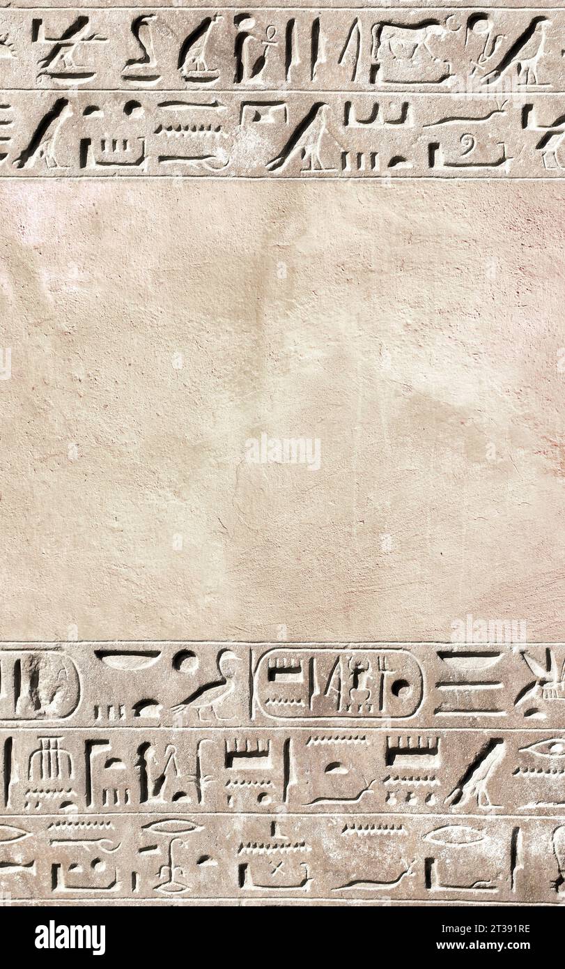 Vertical background with ancient Egyptian hieroglyphs on stone wall ...