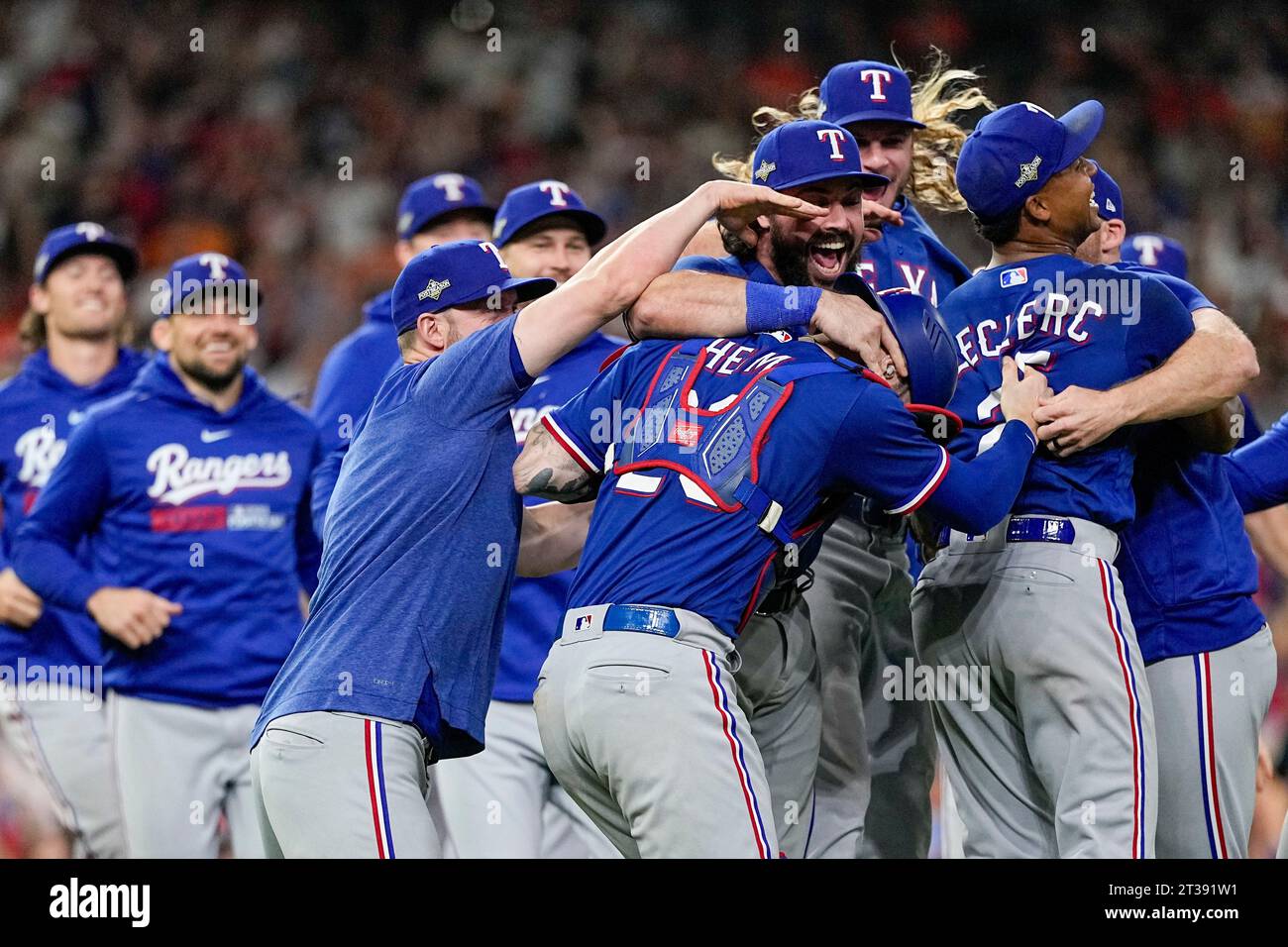 The Texas Rangers celebrate after Game 7 of the baseball AL ...