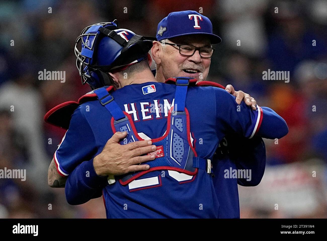 Texas Rangers manager Bruce Bochy huge Jonah Heim after Game 7 of the ...