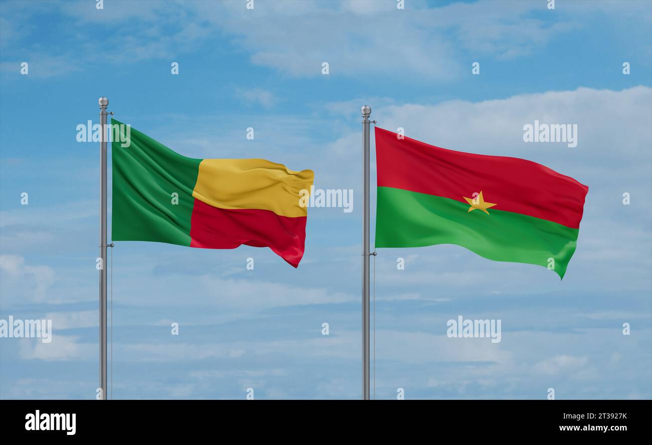 Burkina Faso and Benin flags waving together on blue cloudy sky, two country relationship ...