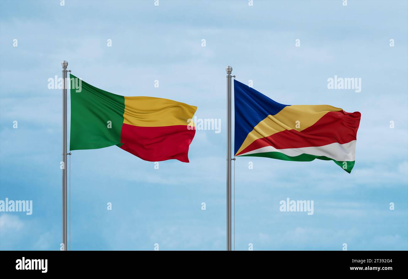 Seychelles and Benin flags waving together in the wind on blue cloudy sky, two country ...