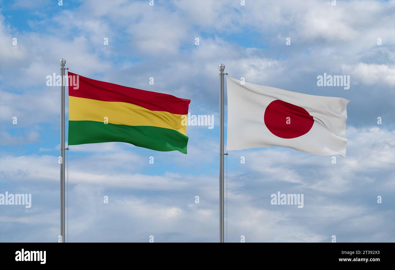 Japan and Bolivia flags waving together on blue cloudy sky, two country ...
