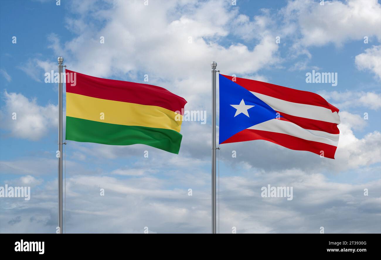 Puerto Rico and Bolivia flags waving together in the wind on blue ...