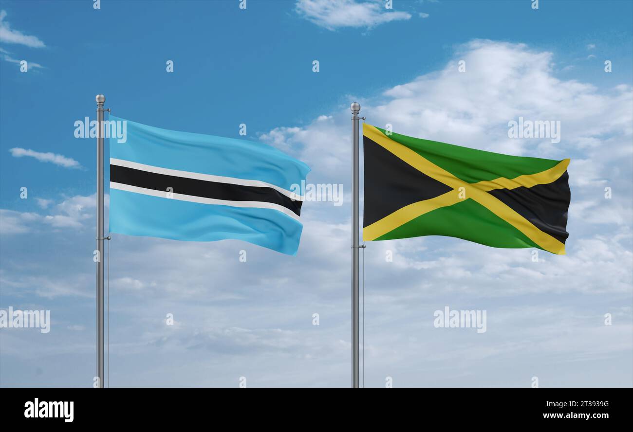 Jamaica and Botswana flags waving together in the wind on blue cloudy sky, two country ...