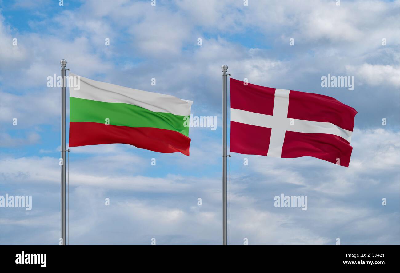 Denmark and Bulgaria flags waving together on blue cloudy sky, two ...