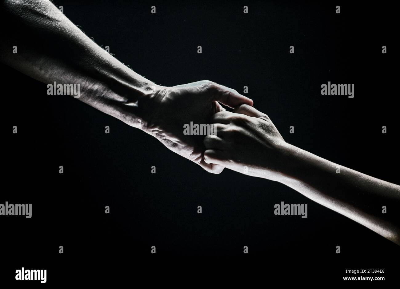 Helping hand outstretched, arm on salvation. Close up strong hand. Two ...