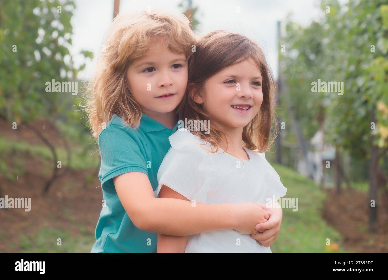 Little boy hugging shy girl, toddler boy embracing depressed little ...