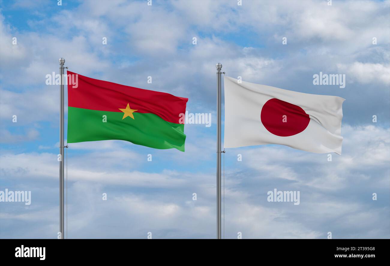 Japan and Burkina Faso flags waving together on blue cloudy sky, two ...