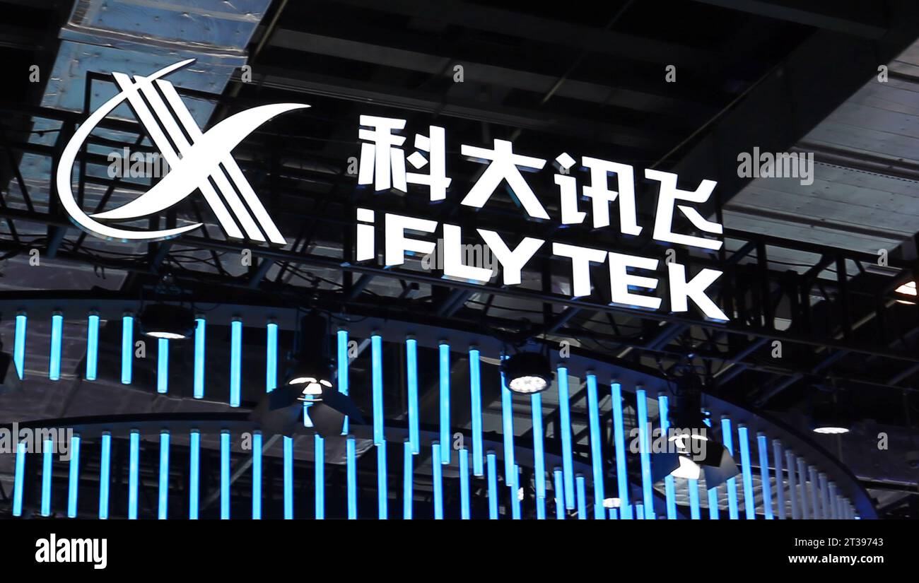 Spectators look at IFlytek's Spark Desk at the World Artificial ...