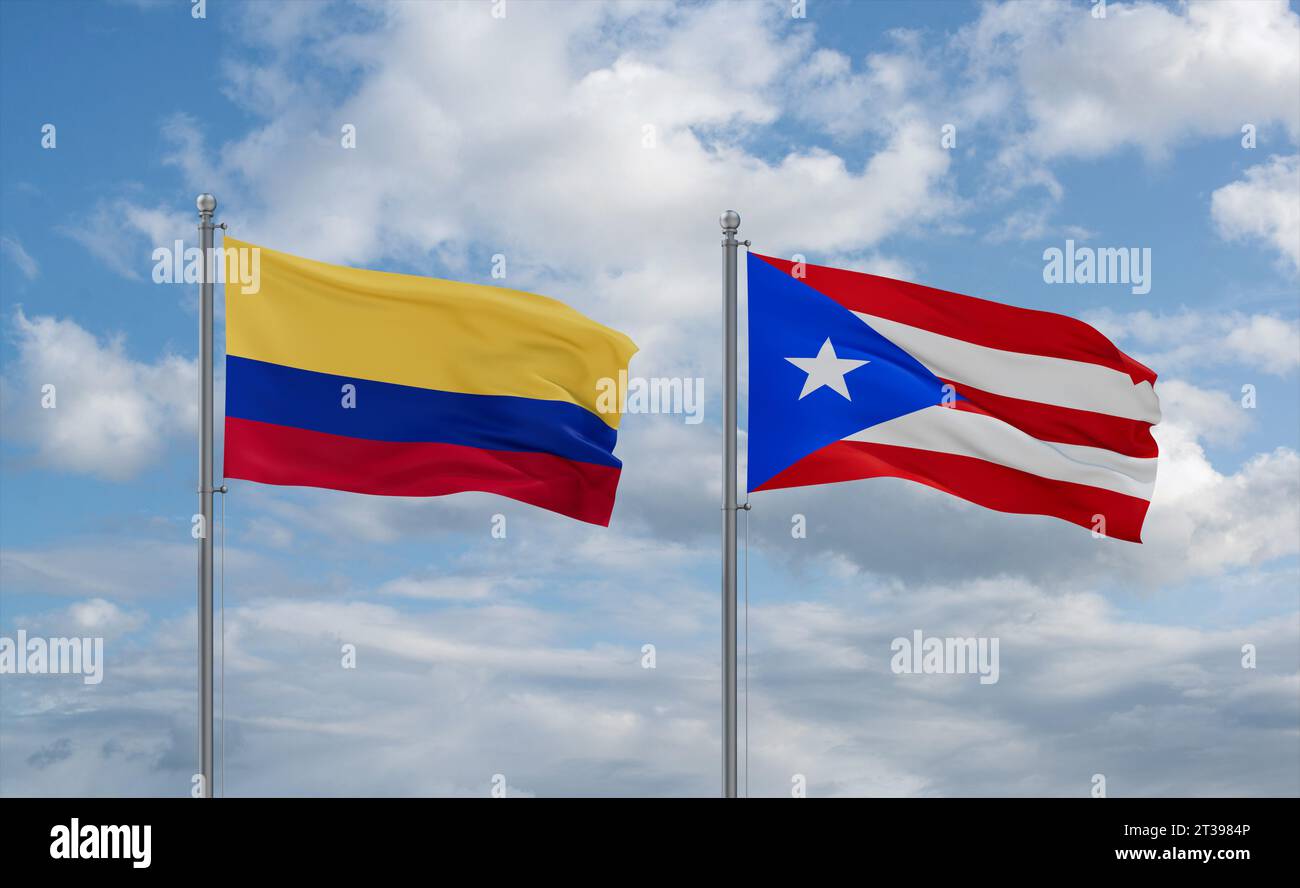 Puerto Rico and Colombia flags waving together in the wind on blue ...