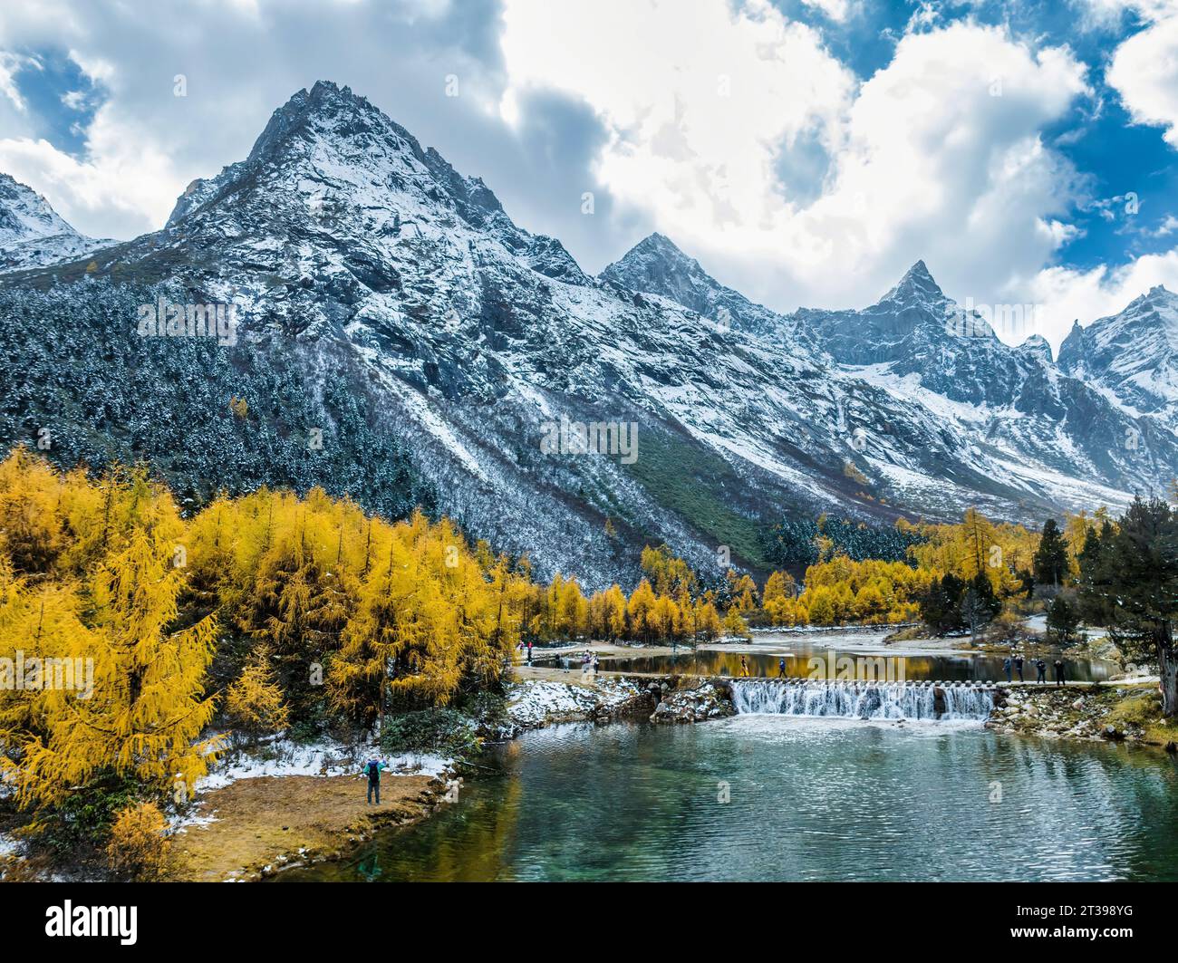 Aerial photo shows the autumn snowy scenery of Bipenggou Valley scenic ...