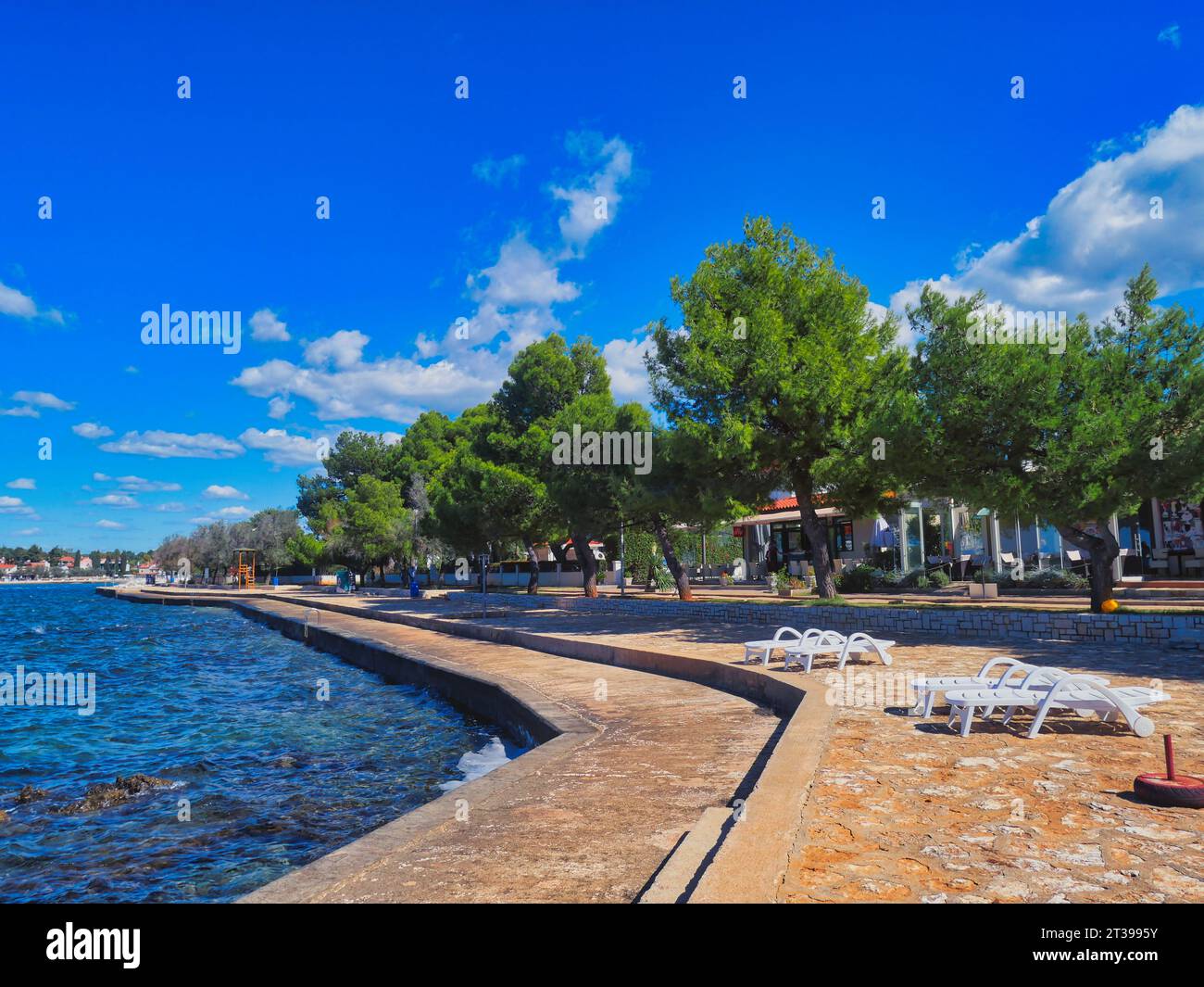Beatiful Beach in Porec, Croatia (Blue sky Stock Photo - Alamy