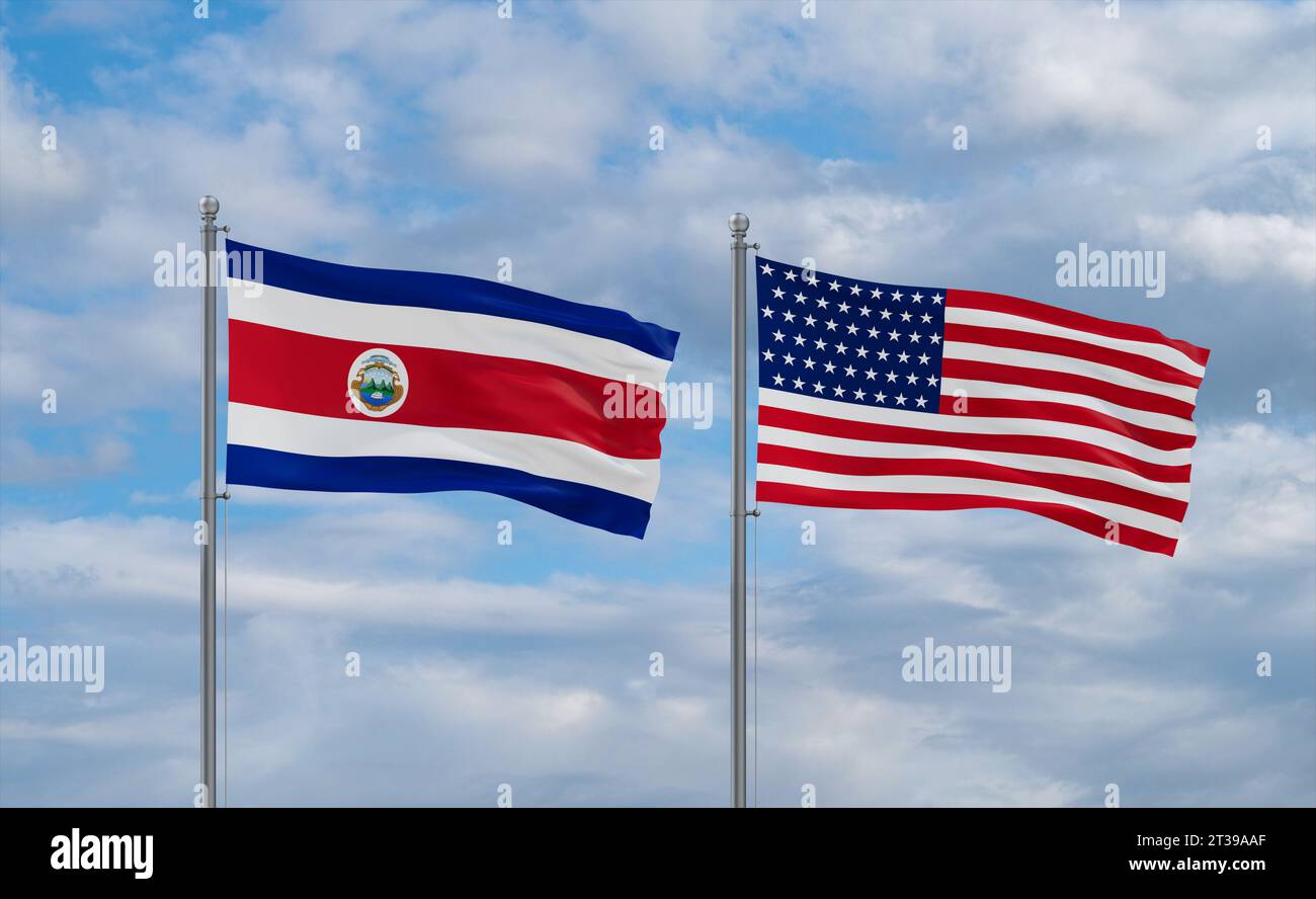 USA and Costa Rico flags waving together in the wind on blue cloudy sky ...