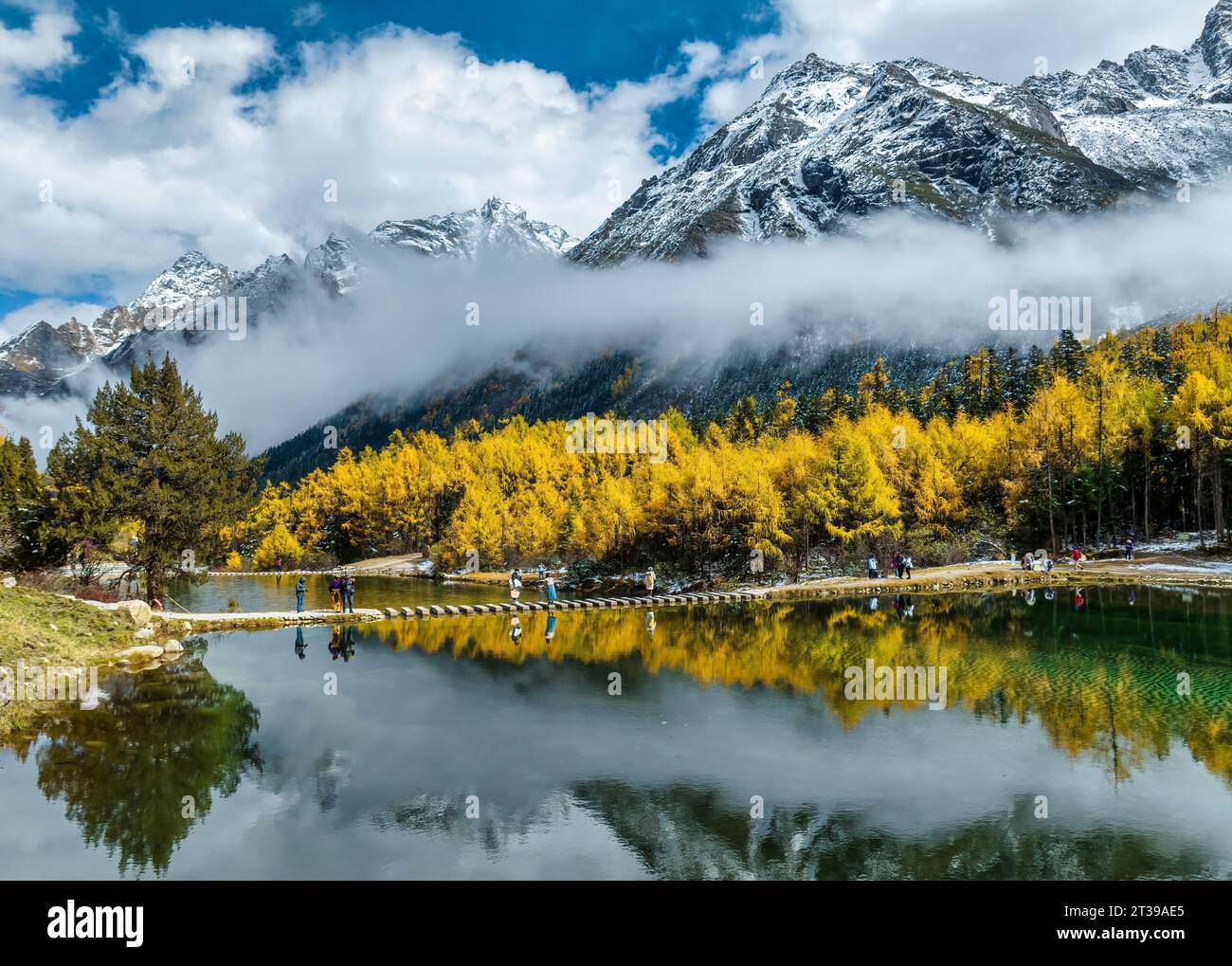 Aerial photo shows the autumn snowy scenery of Bipenggou Valley scenic ...