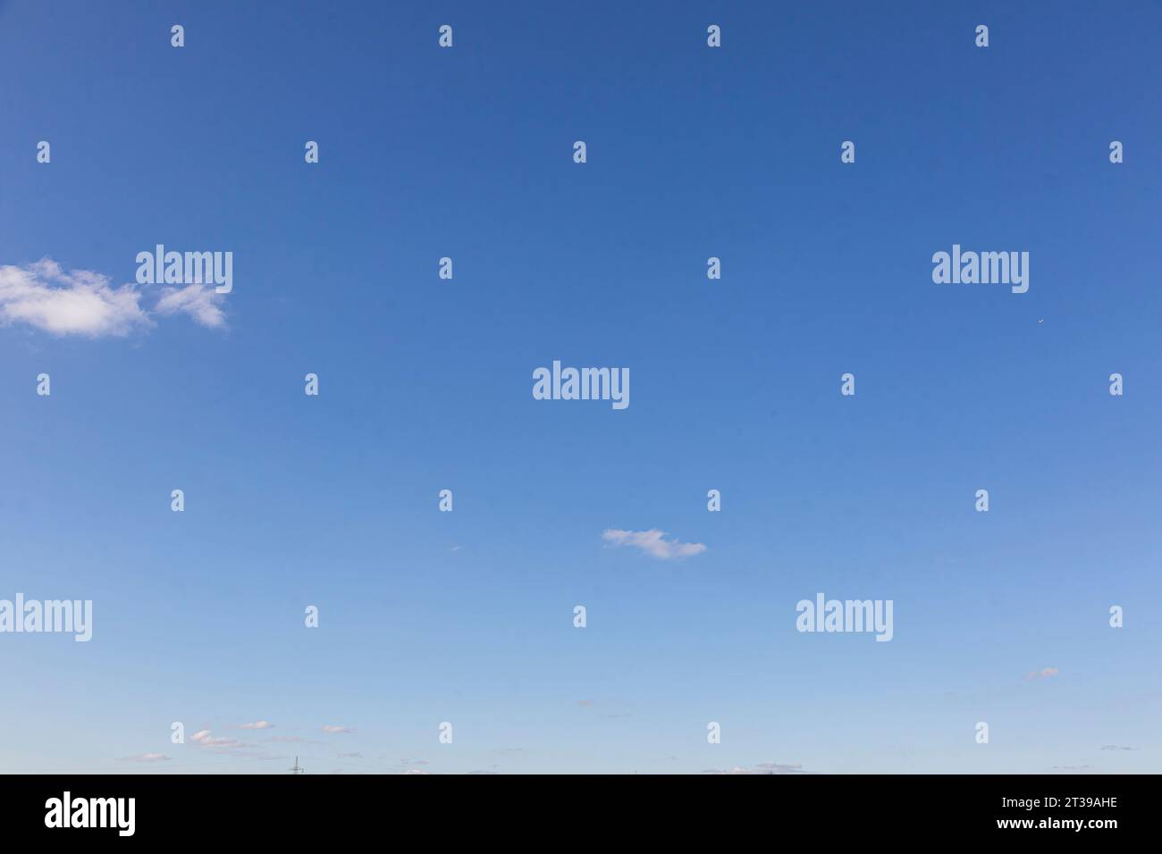 Image of a partly cloudy and partly clear sky during the day without ...