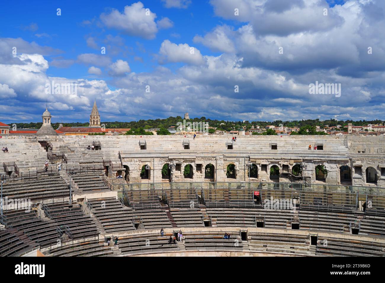 NIMES, FRANCE – 14 MAY 2023- Sunny view of the Roman Arena in Nimes ...