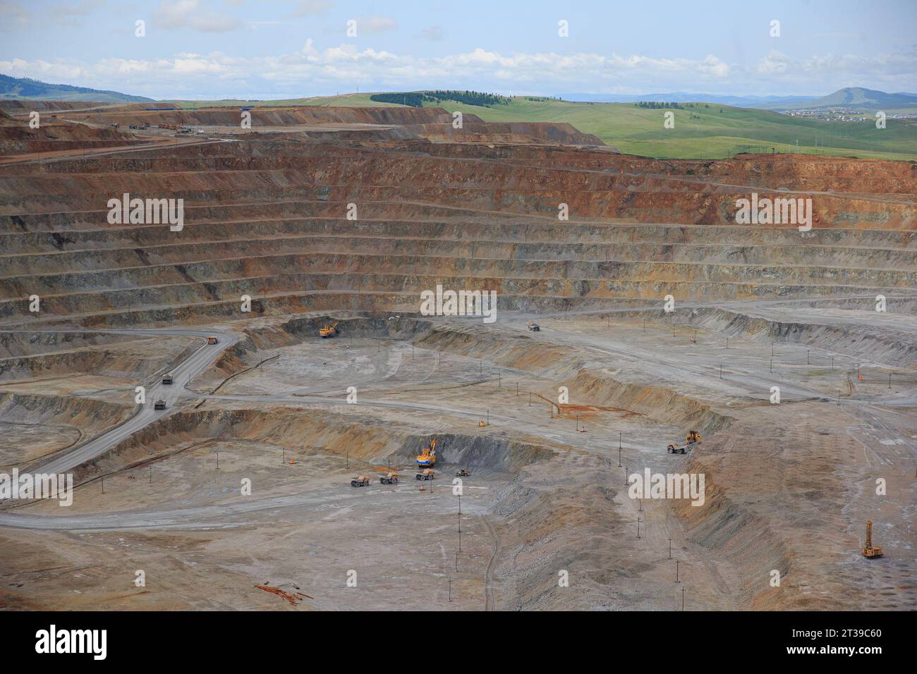 Erdenet, Mongolia. 24th June, 2023. Benches of an open-pit copper mine of the Erdenet Mining ...