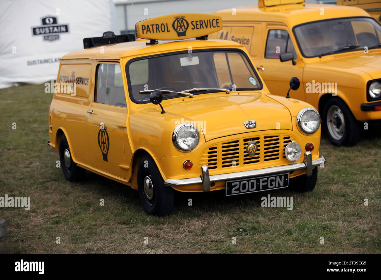 Three-quarters front view of an AA Patrol Services, Yellow, 1963 ...
