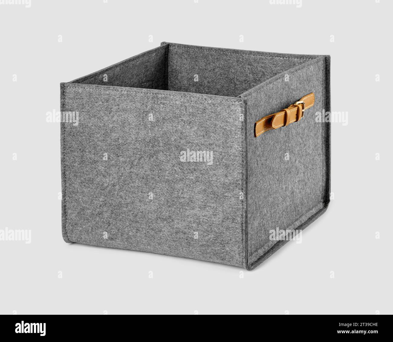 Gray felt storage organizer box with leather handles and buckles Stock ...