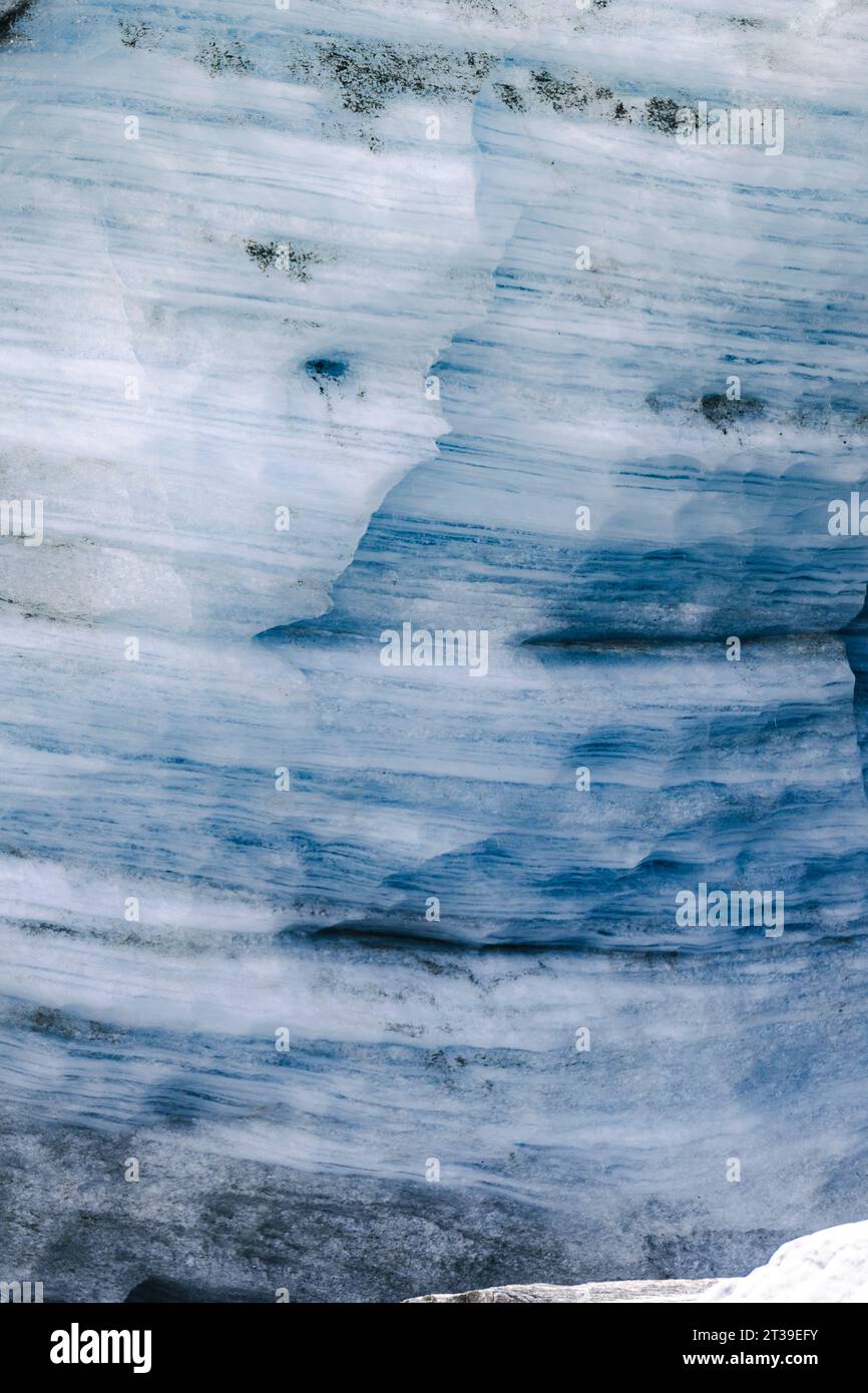 Close-up of the layered structure of a glacier showcasing the beauty of ...