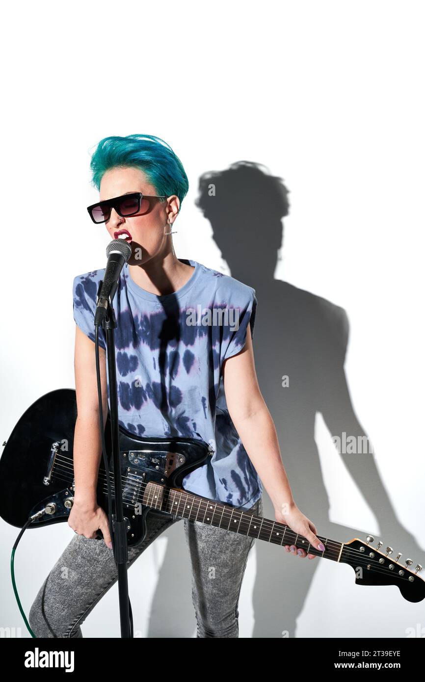 Professional guitarist female singer perform hi-res stock photography ...
