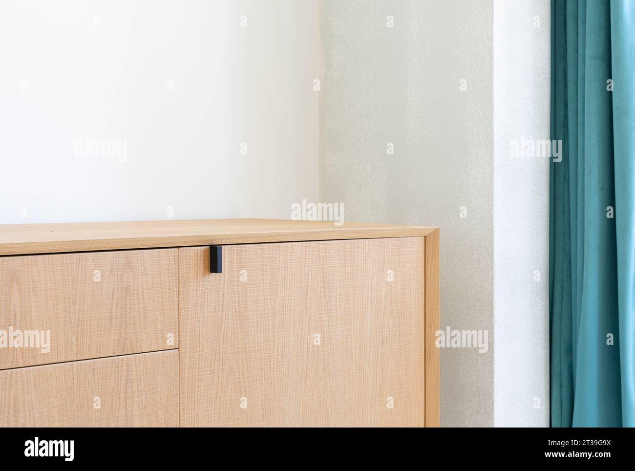 Close-up of a wooden cabinet with detailed texture, set against a ...