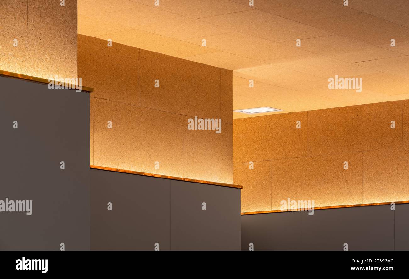 Close-up of a modern interior design with contrasting cork and dark ...