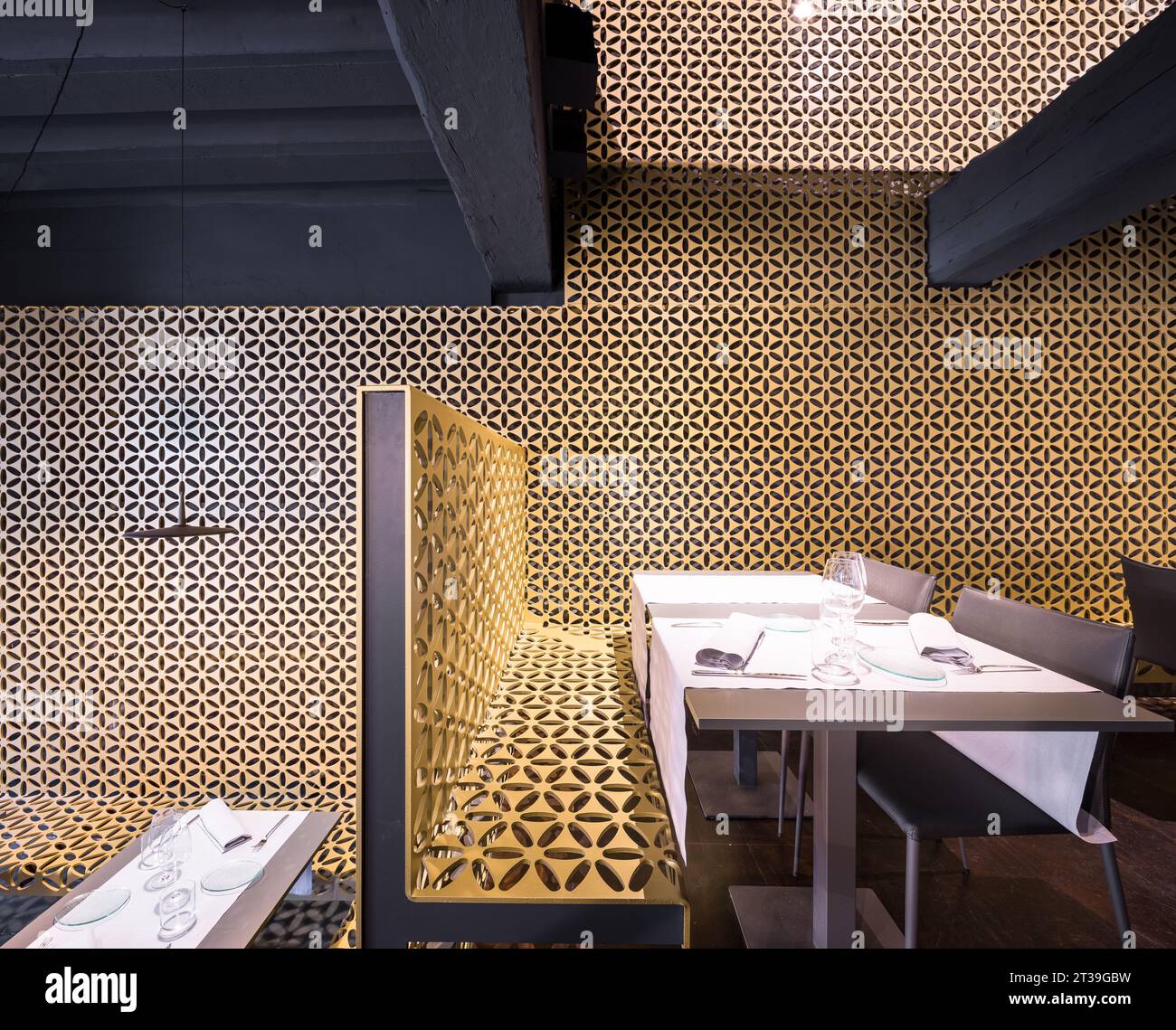 Photo of a modern dining table in an elegant room restaurant with ...