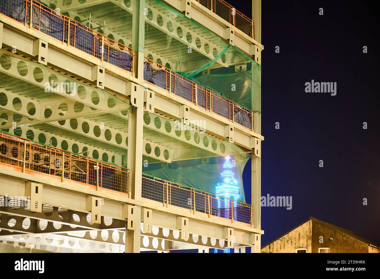 Lights of Blackpool Tower shining through skeleton of under ...