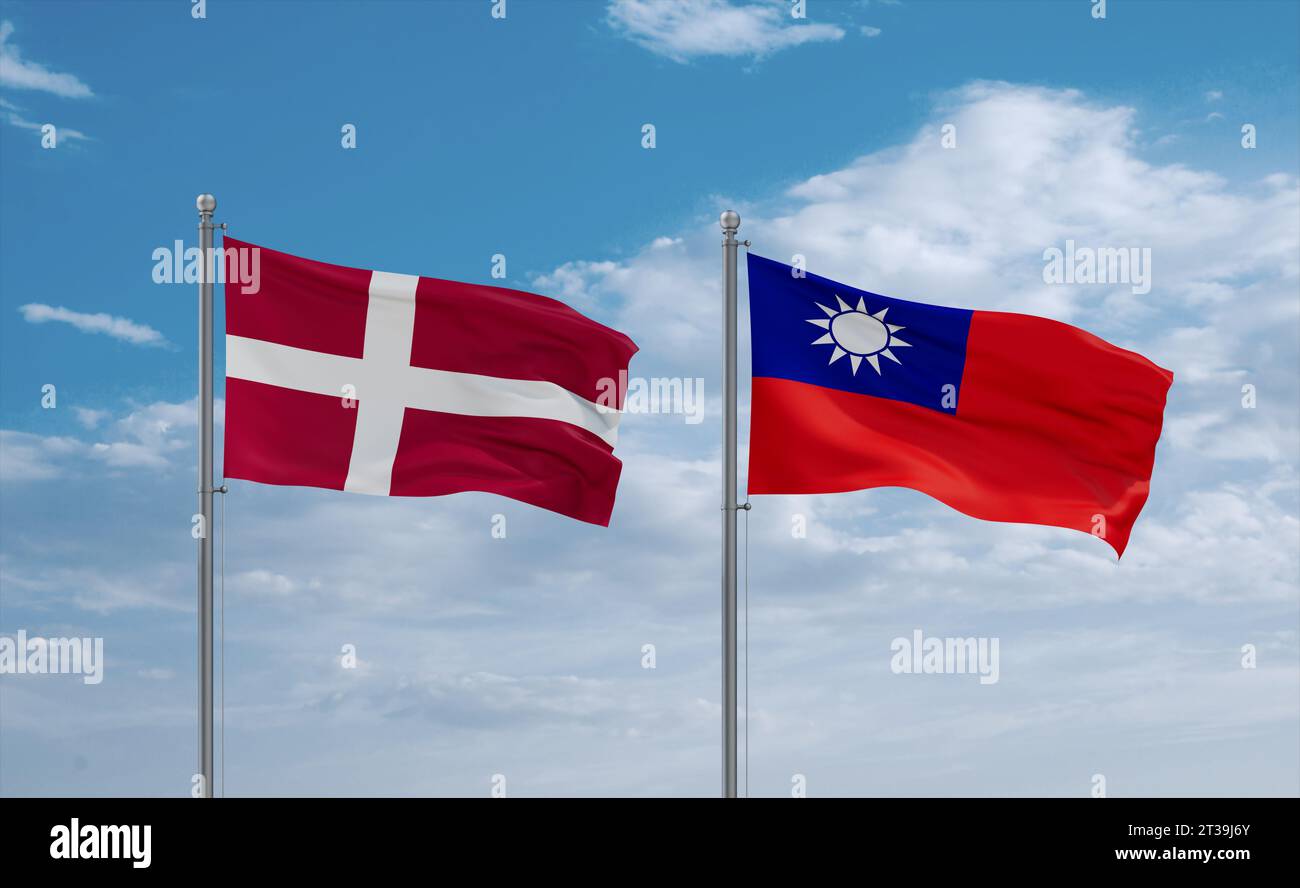 Taiwan and Denmark flags waving together in the wind on blue cloudy sky ...