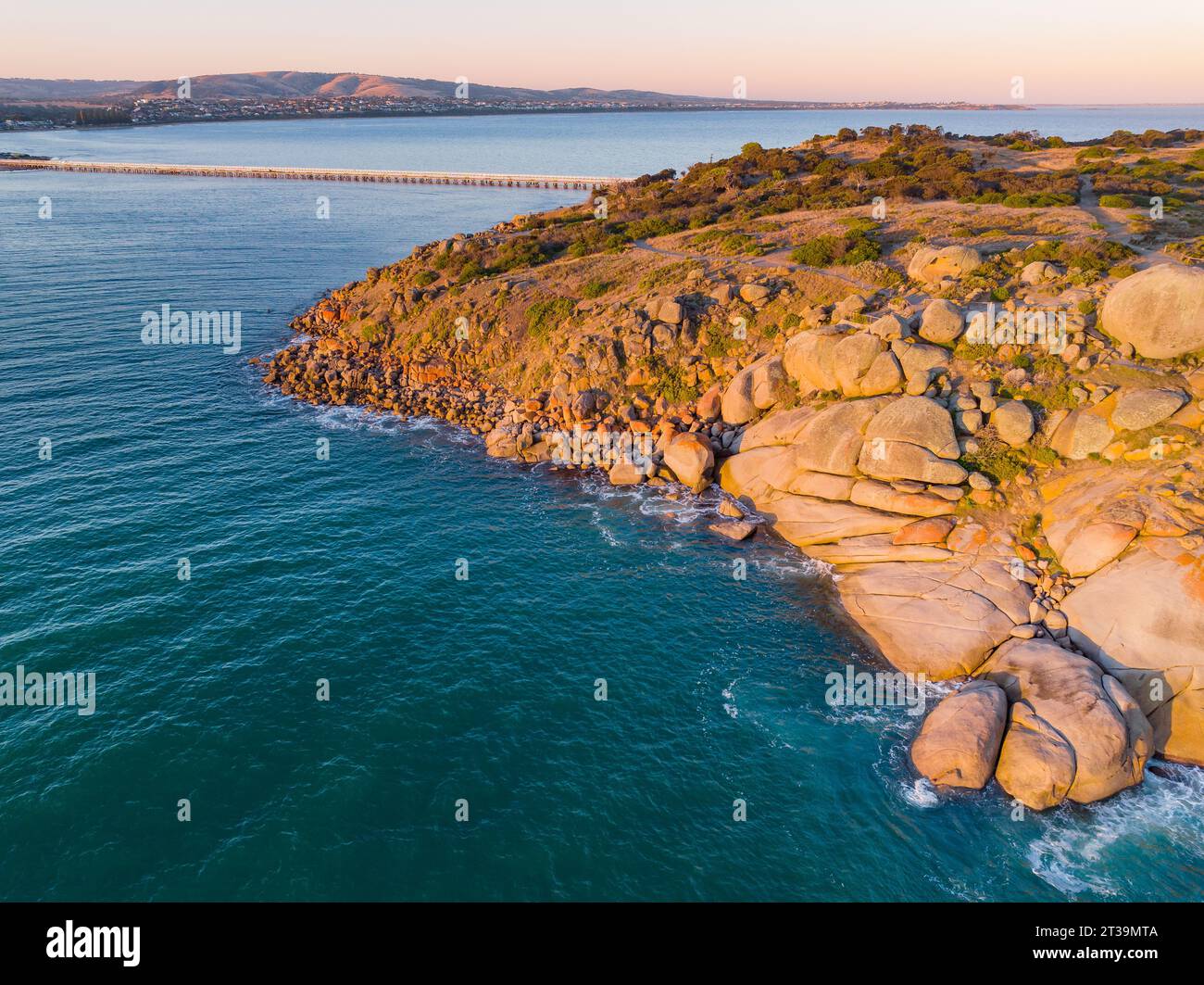 Aerial view of rocky shoreline around Granite Island at Victor Harbour ...