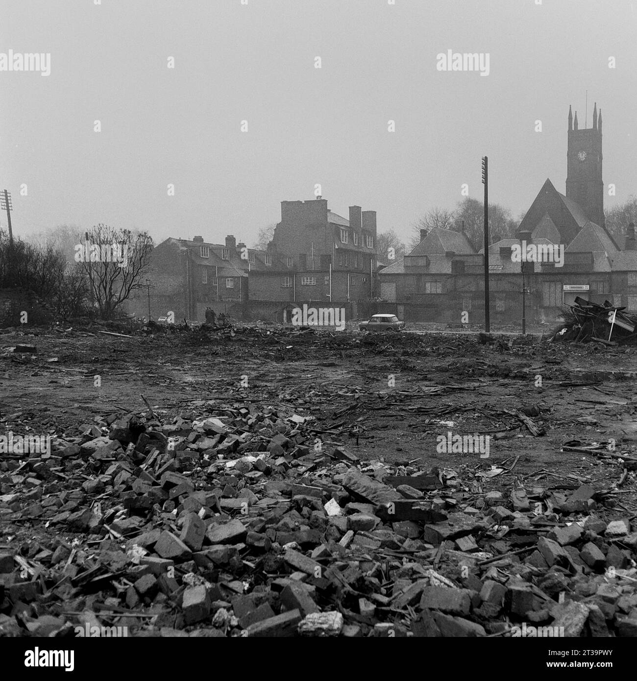 Rubble strewn wasteland of demolished buildings during the slum ...