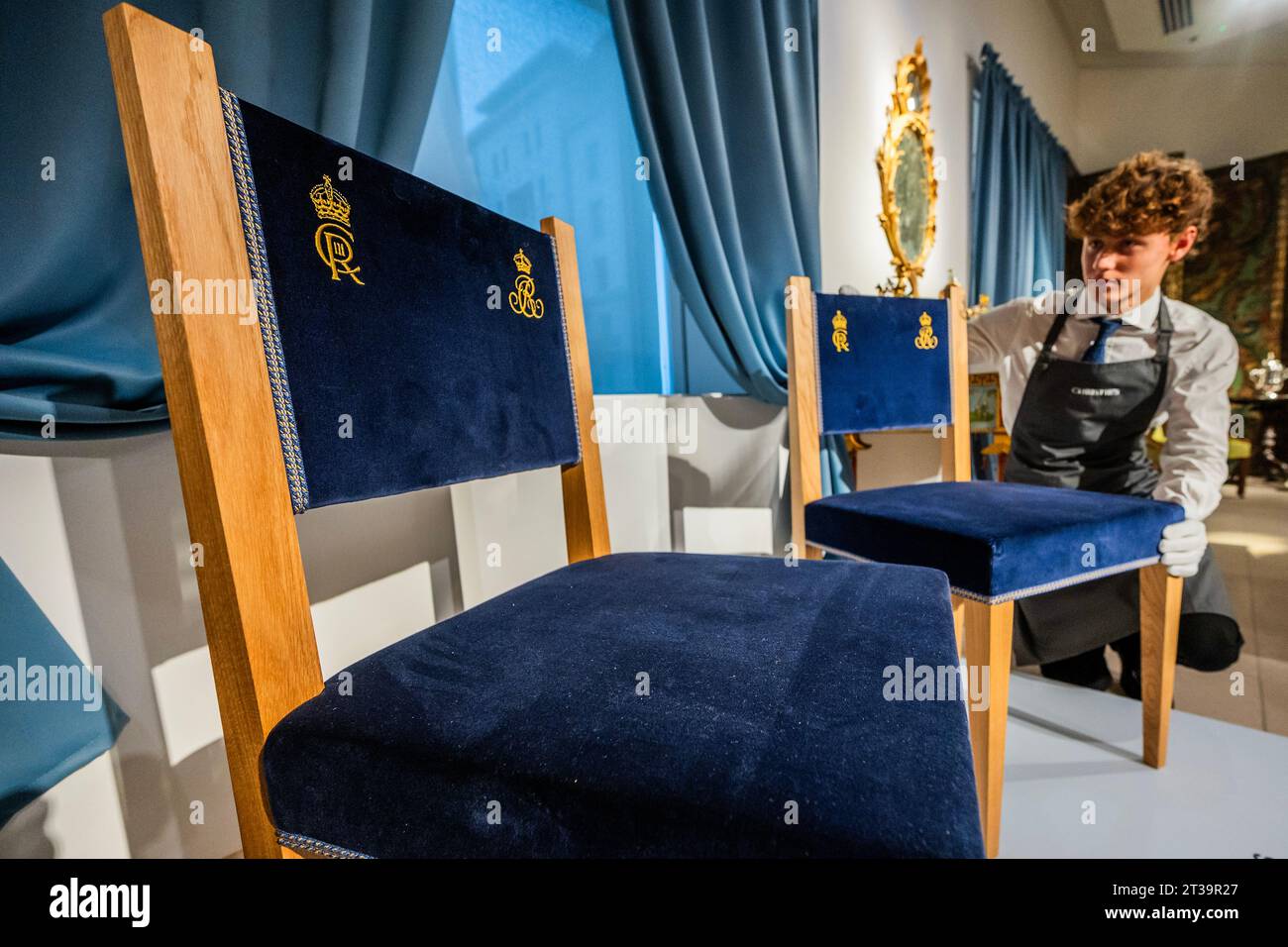London, UK. 24 Oct 2023. One of six pairs of Coronation Chairs (est per ...