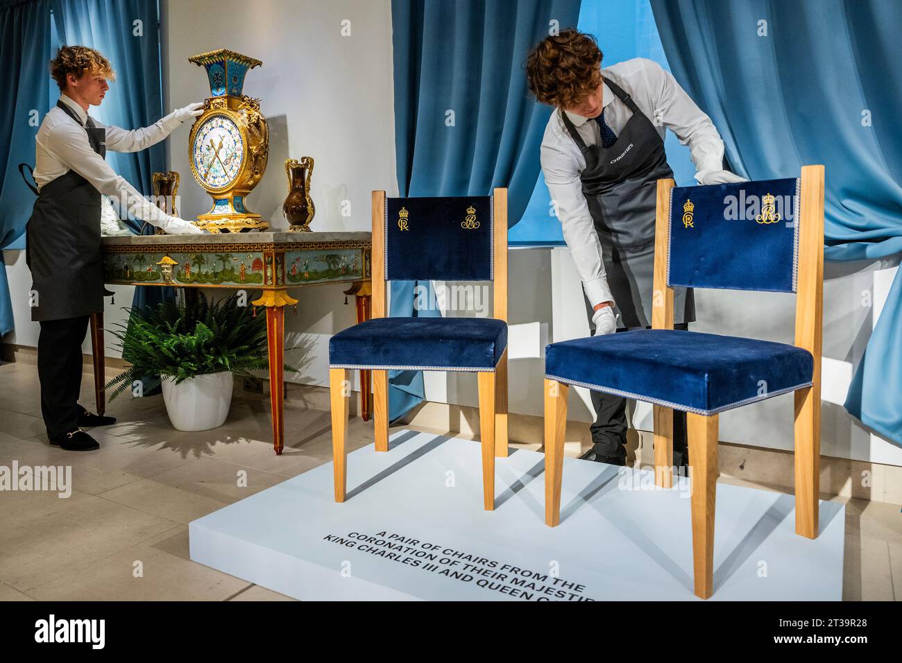 London, UK. 24 Oct 2023. One of six pairs of Coronation Chairs (est per ...