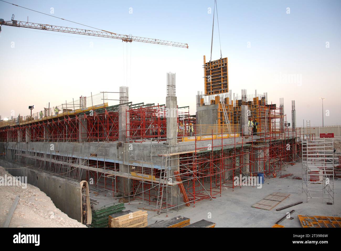 A new shopping mall under construction in the desert outskirts of Doha ...