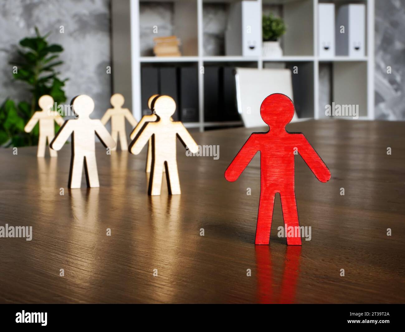 Selecting the best candidate and employee. Figures on the office table ...