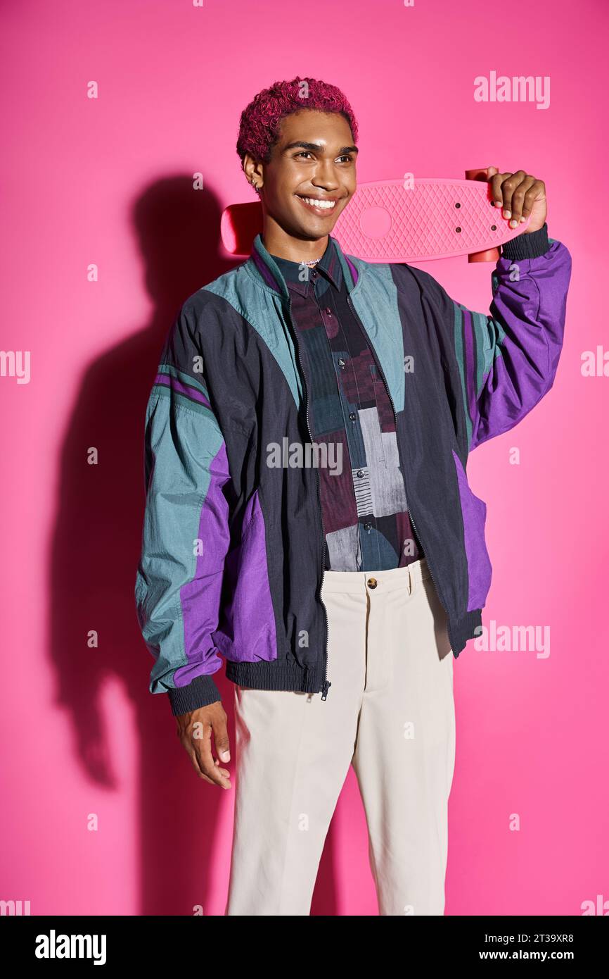 cheerful young male model posing unnaturally and smiling weirdly ...