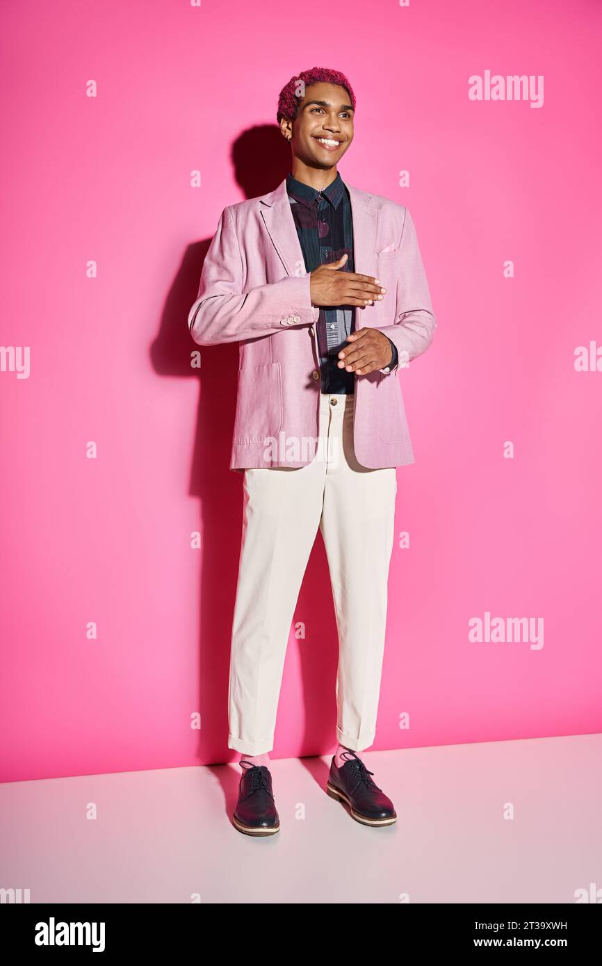 young african american man gesturing unnaturally and smiling weirdly ...