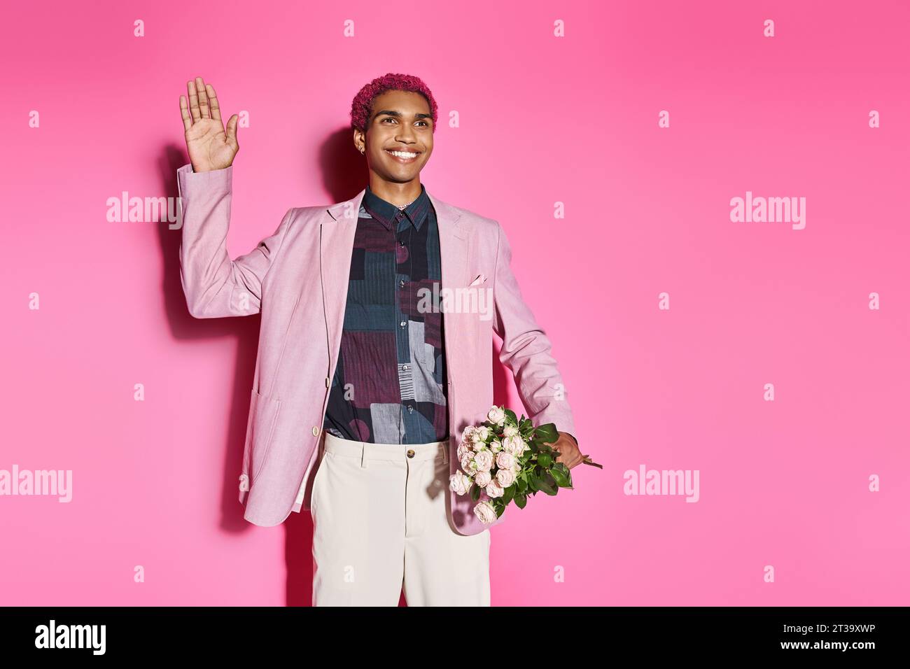 good looking african american man smiling and acting like male doll ...