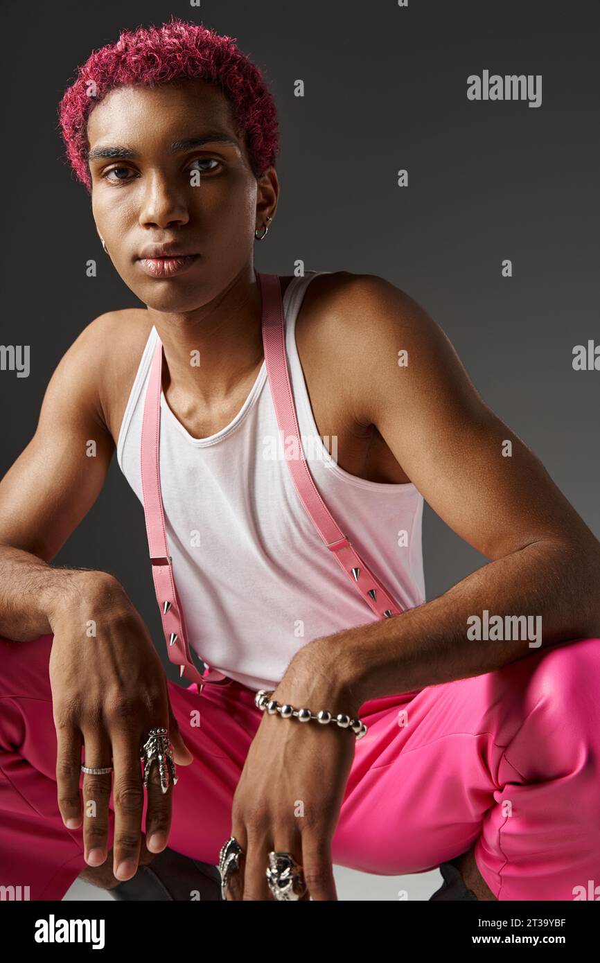 Male model squatting in hi-res stock photography and images - Alamy