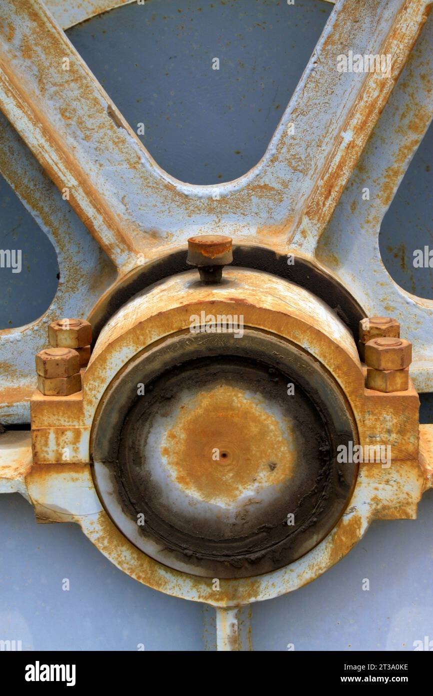 Metal parts with greasy dirt in a factory Stock Photo - Alamy