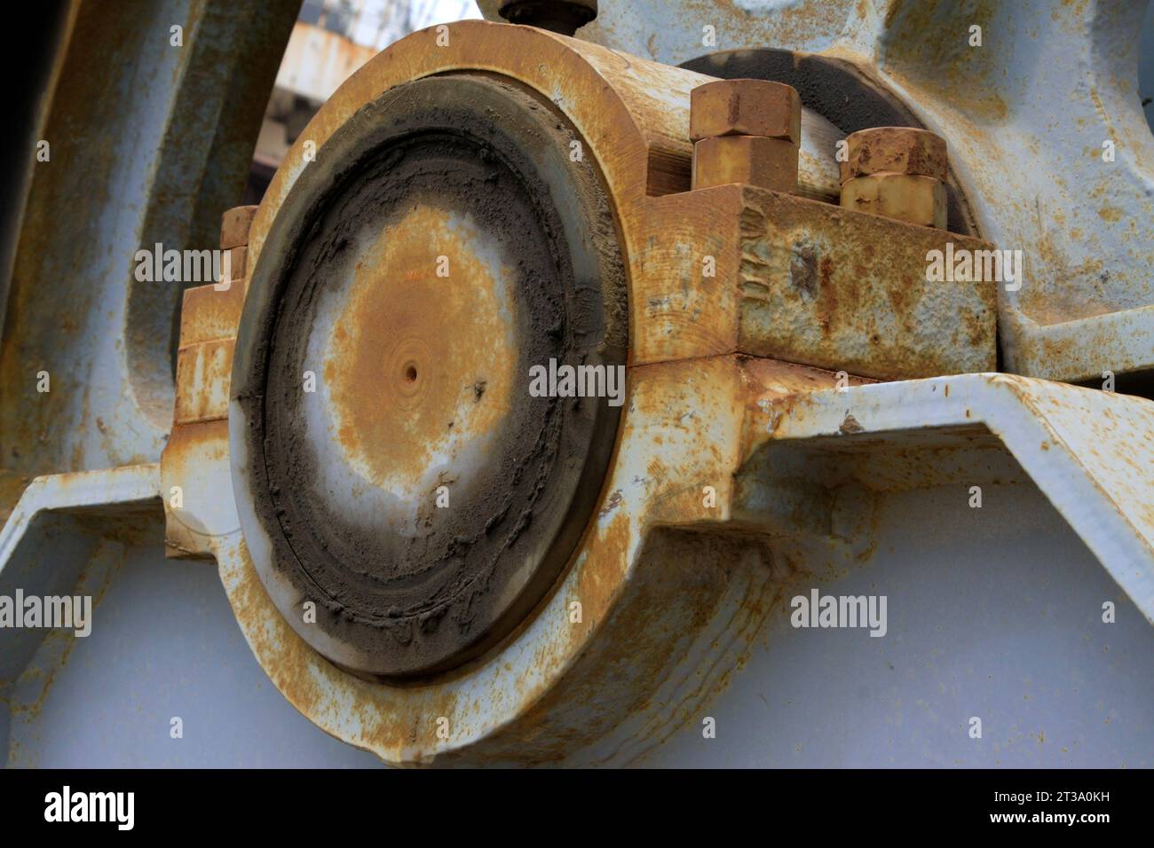 Metal parts with greasy dirt in a factory Stock Photo - Alamy