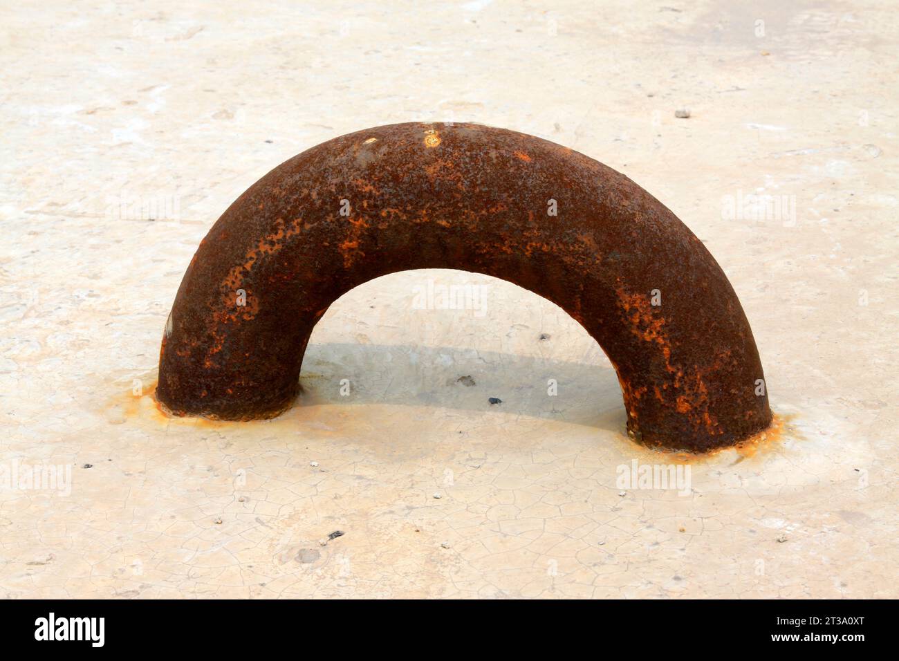 rusting steel fasteners in the concrete floor Stock Photo - Alamy