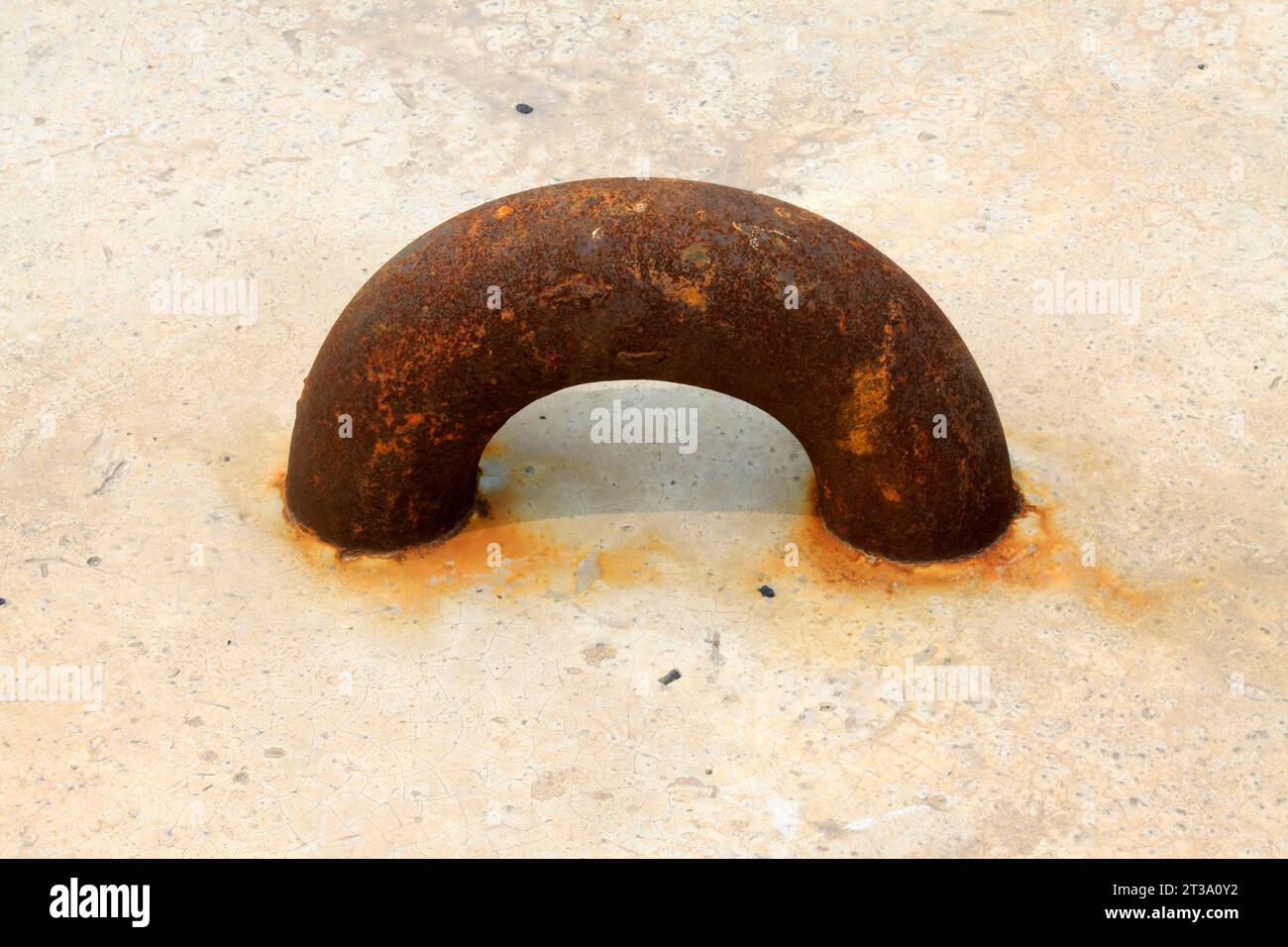rusting steel fasteners in the concrete floor Stock Photo - Alamy