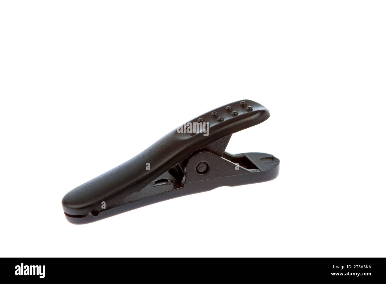 Black plastic clip on a white background Stock Photo - Alamy