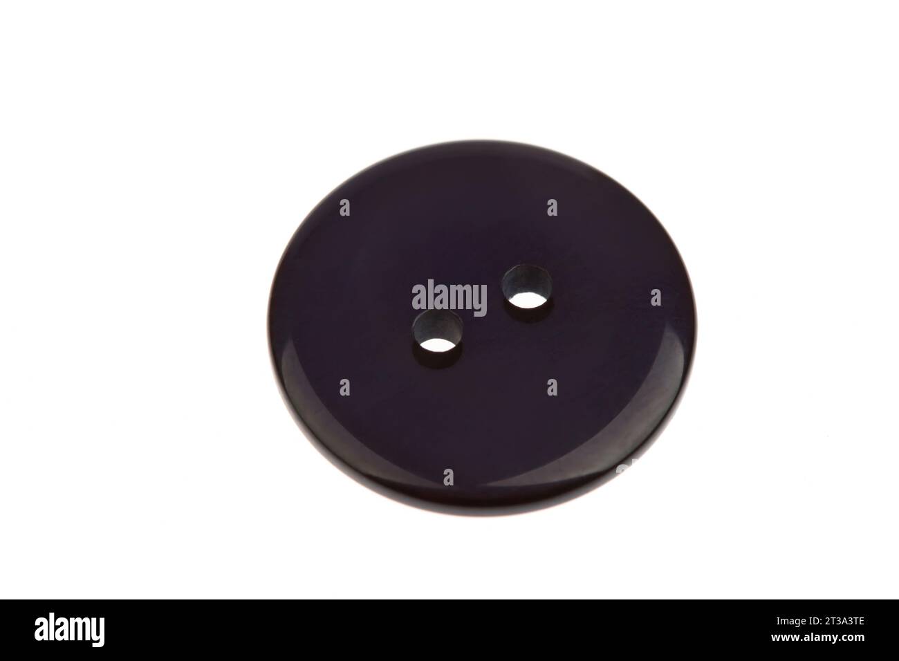 plastic material button on a white background Stock Photo - Alamy