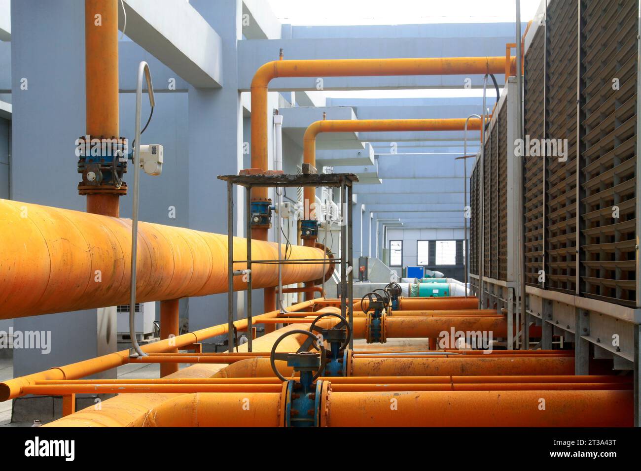 Metal pipe vent in an old factory Stock Photo - Alamy