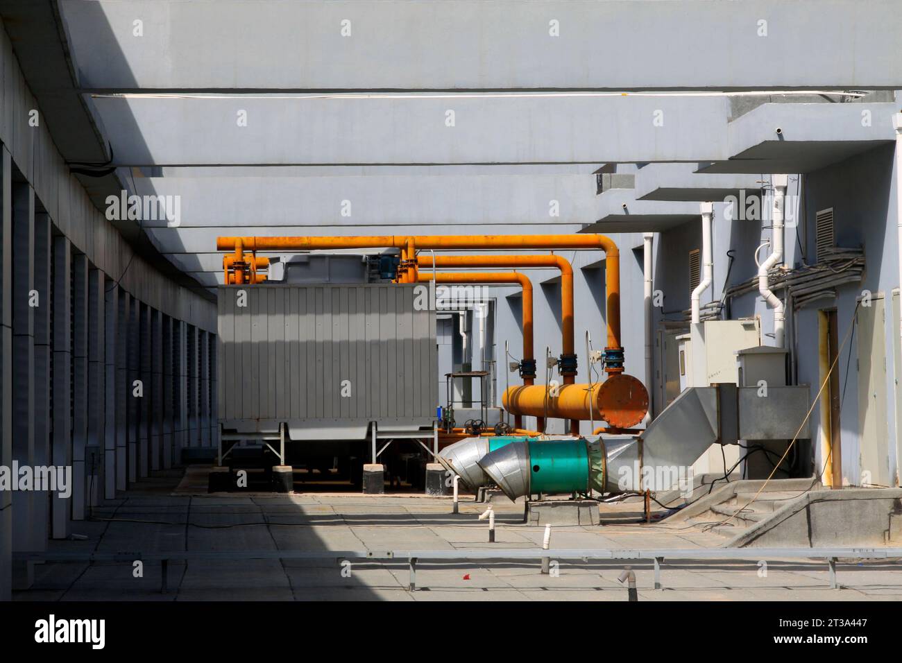 Metal pipe vent in an old factory Stock Photo - Alamy